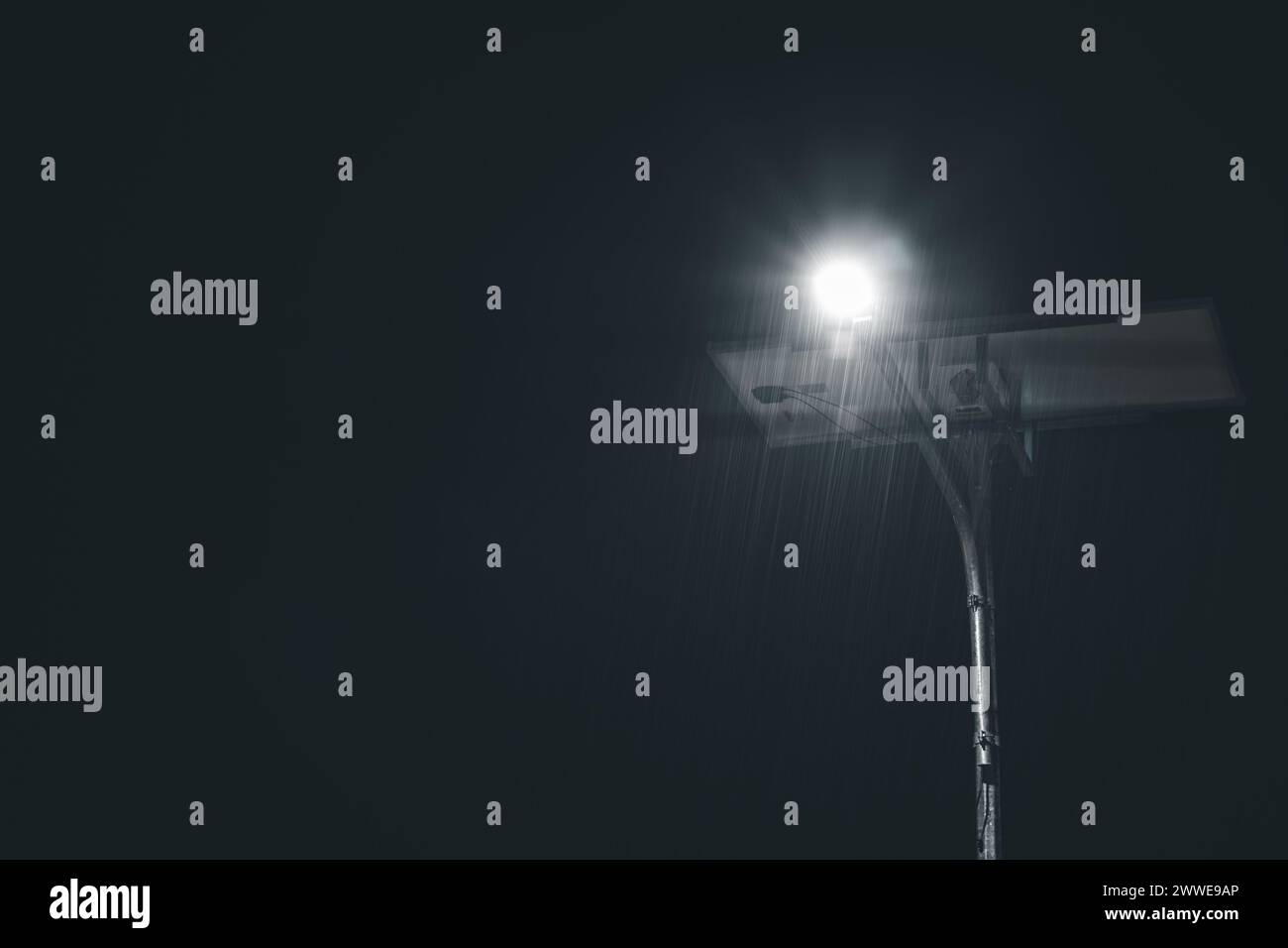 Solar Street Light Pole at night when it rains Stock Photo - Alamy
