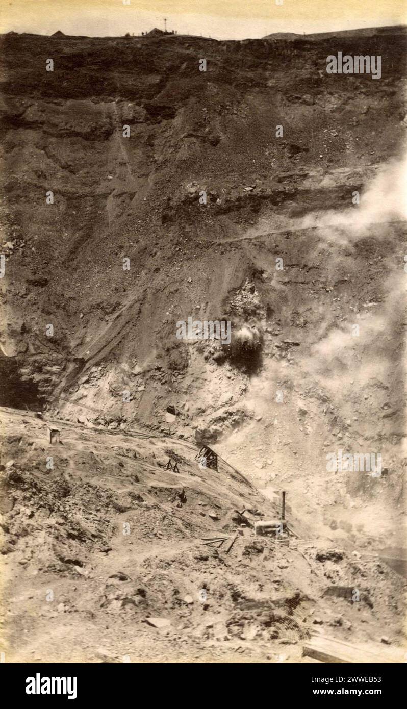 A photograph taken in 1885 showing blasting operations in a Kimberley ...