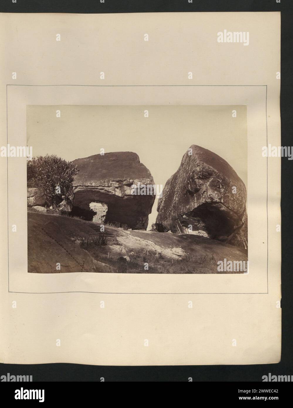 Description: Anuradhapura. Overhanging rocks, and ruins of Priests ...