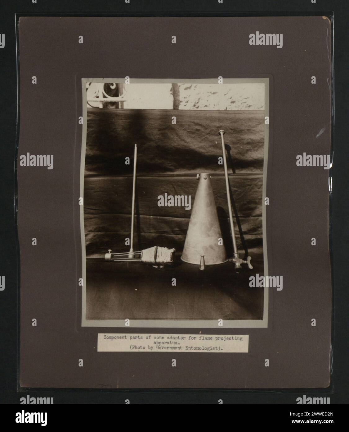 The cone adaptor for a flame projecting apparatus is shown in parts in ...