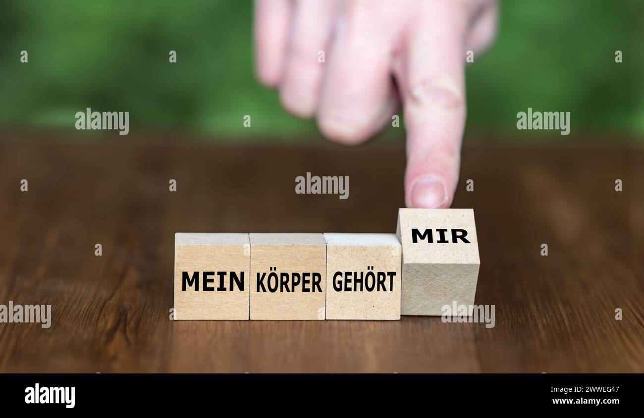 Wooden cubes form the German expression 'mein Koerper gehoert mir' (my ...