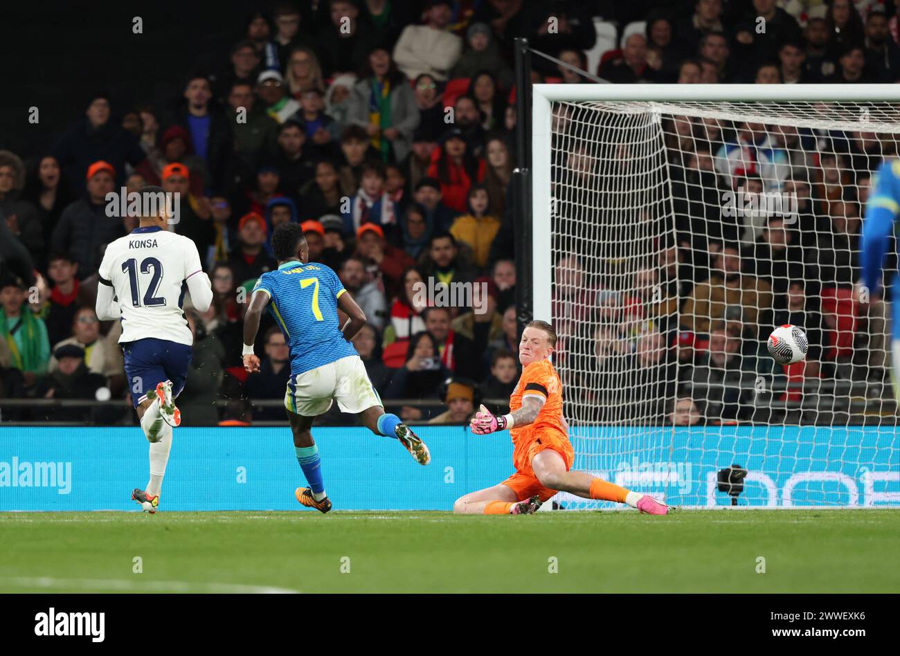 London, UK. 23rd Mar, 2024. Vinicius Junior (B) scores past Jordan ...
