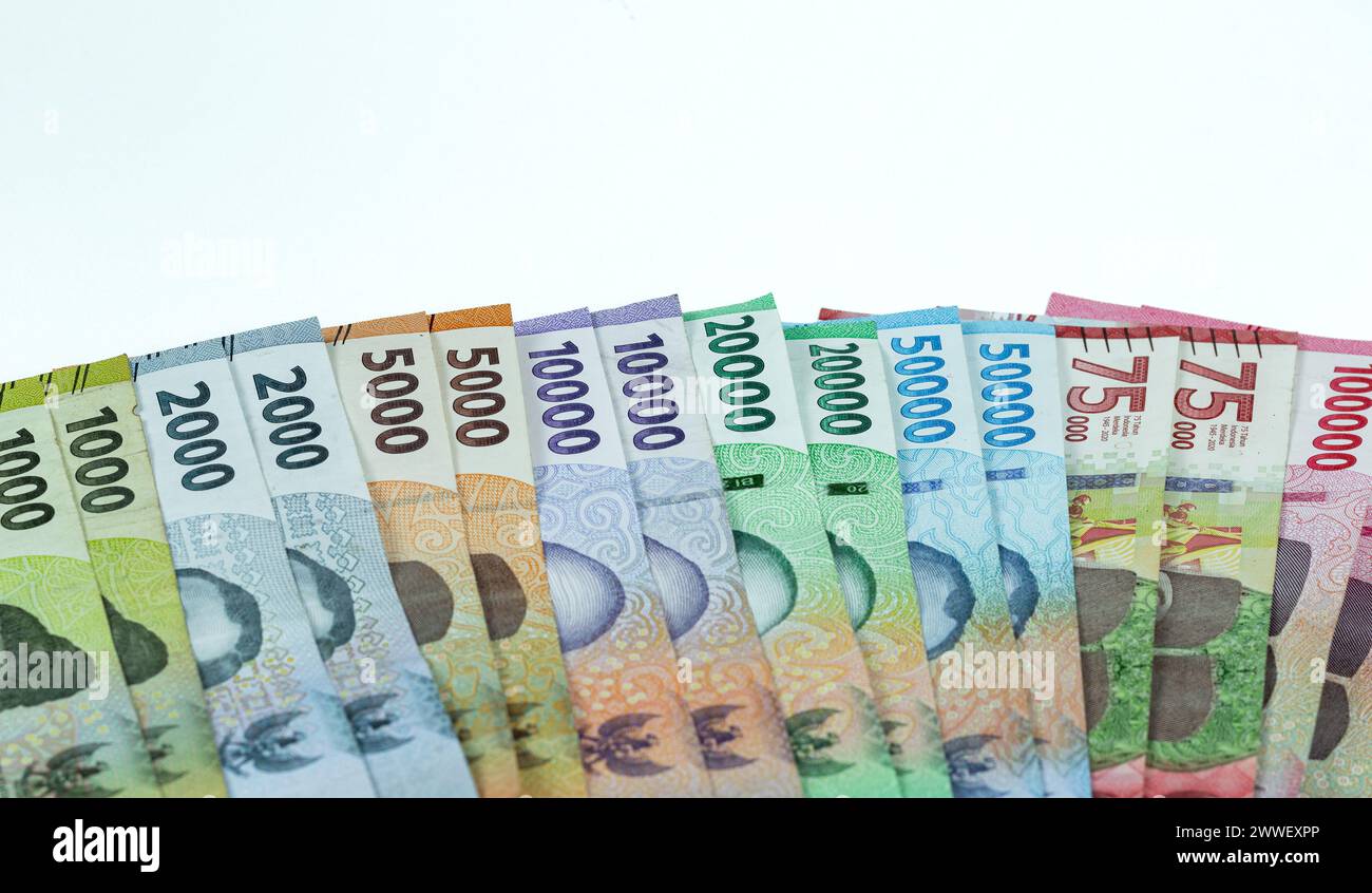 Indonesian currency . Stack of Rupiah or IDR banknotes isolated on ...
