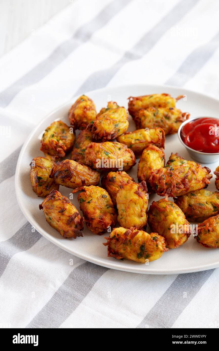 Homemade Fried Tater Tots on a Plate, side view Stock Photo - Alamy