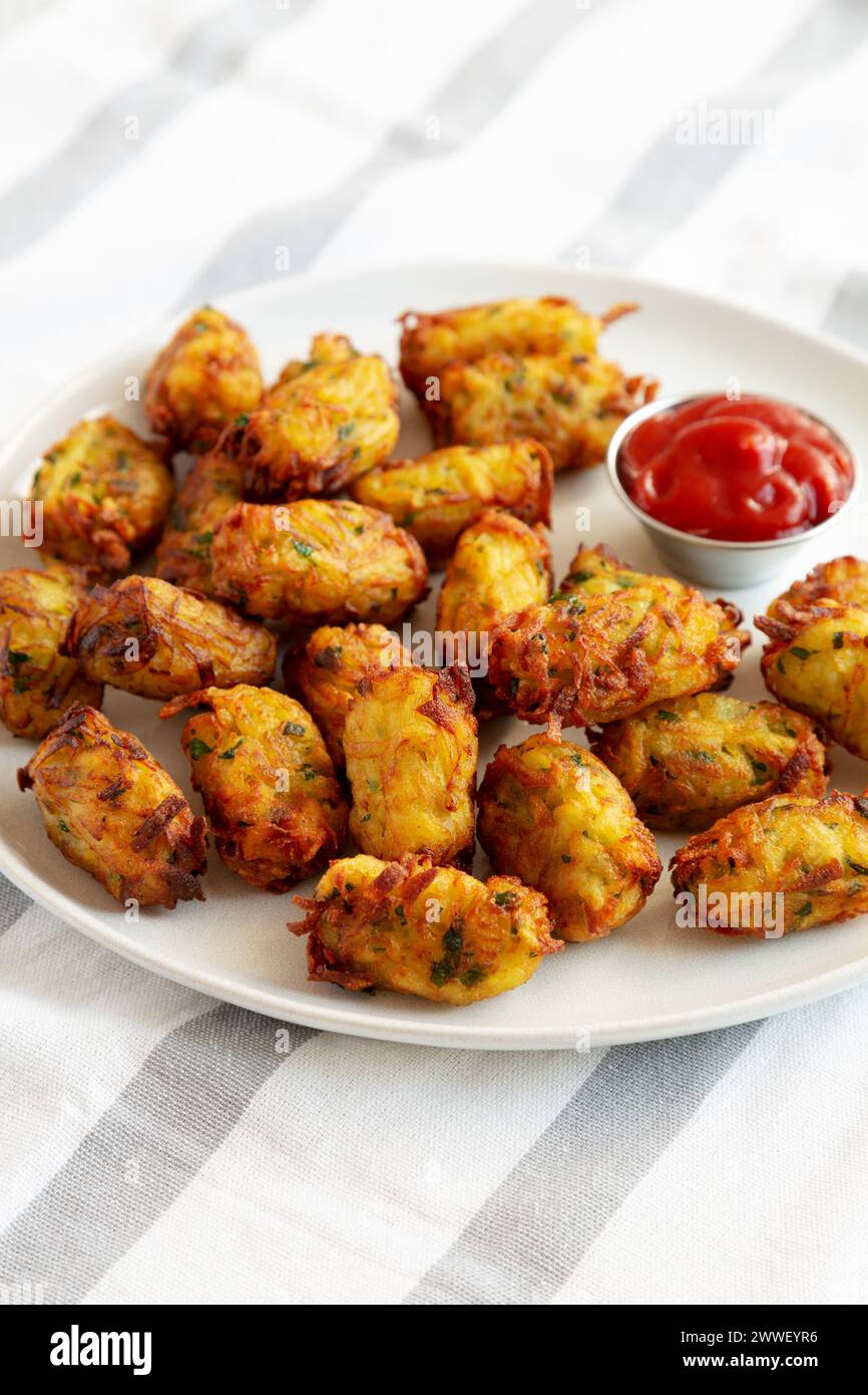 Homemade Fried Tater Tots on a Plate, side view Stock Photo - Alamy