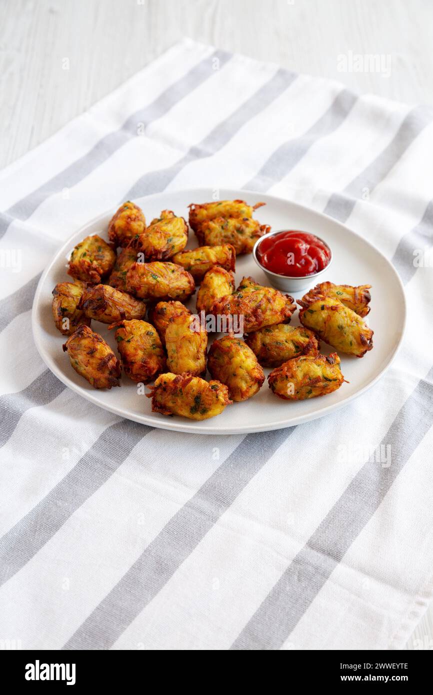 Homemade Fried Tater Tots on a Plate, side view Stock Photo - Alamy