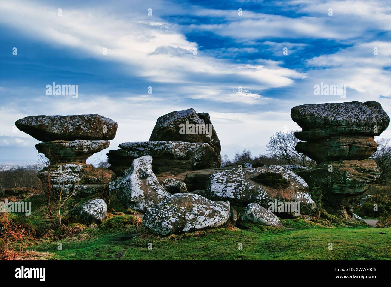 Scenic view of unique rock formations under a blue sky with clouds at ...