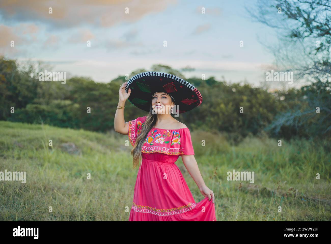 Mexican woman wearing traditional hat hi-res stock photography and ...