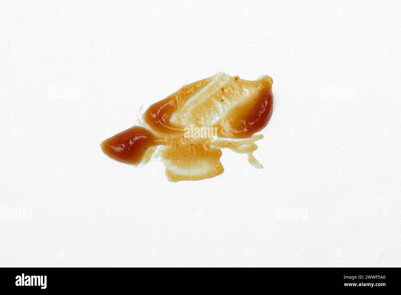 Tomato sauce stain isolated on white background Stock Photo - Alamy