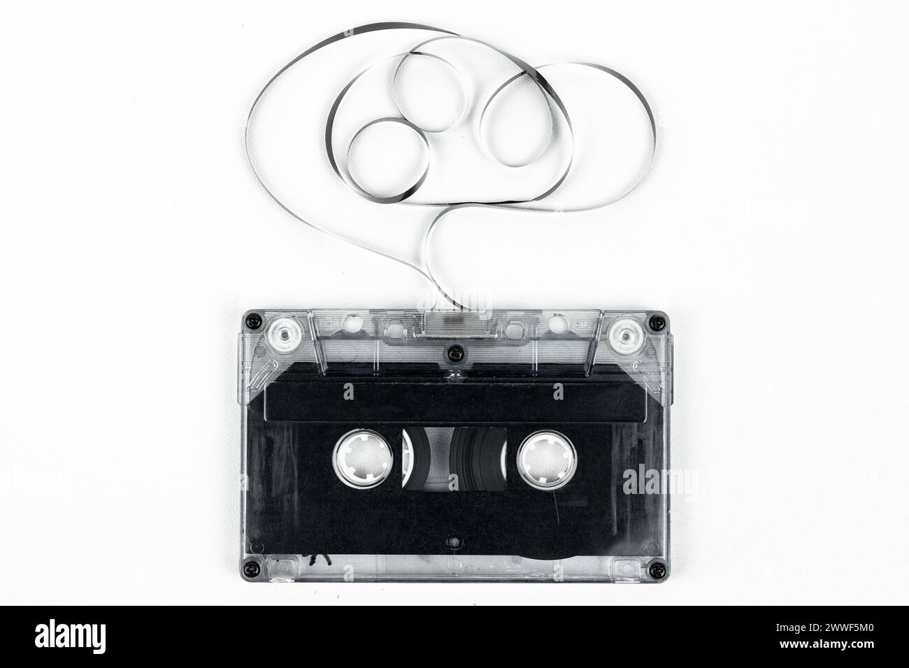 Audio cassette tape. Vintage cassette with crumpled ribbon on white ...