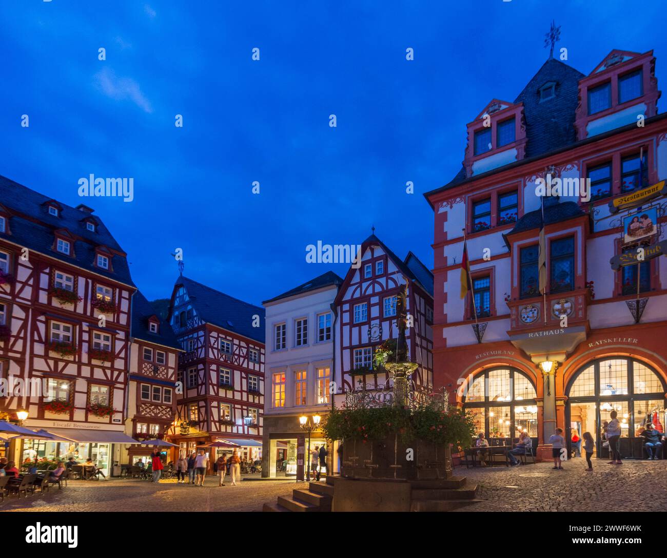 square Marktplatz, half-timbered houses, open air restaurant, St ...