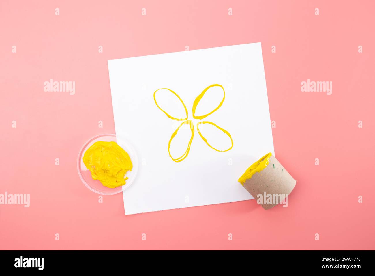 making paper craft butterflies, stamp, paint tubes, recycling concept ...