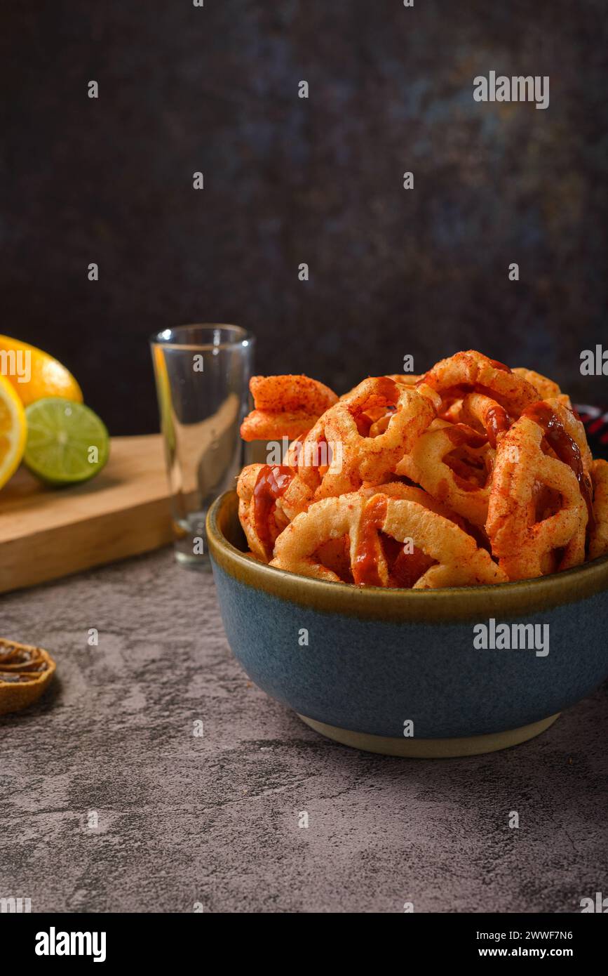 Fried Mexican wheat chips with hot sauce. Duritos, typical Mexican ...