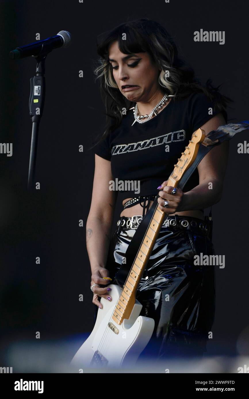 Puerto Rican singer Gale makes a face after her guitar slipped from her ...