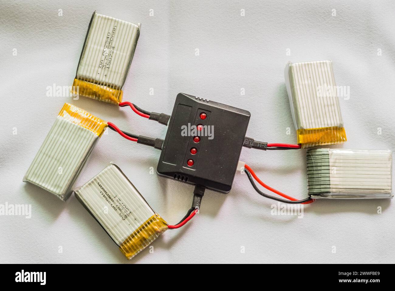 A USB hub connected to multiple lithium polymer batteries for charging ...