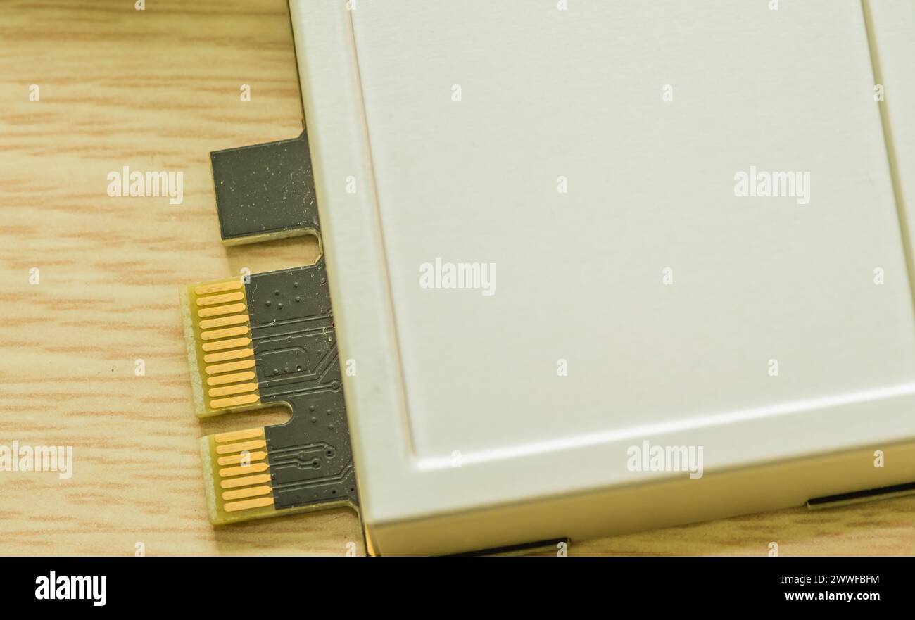 An array of USB flash drives with beige casing and gold connectors, in ...