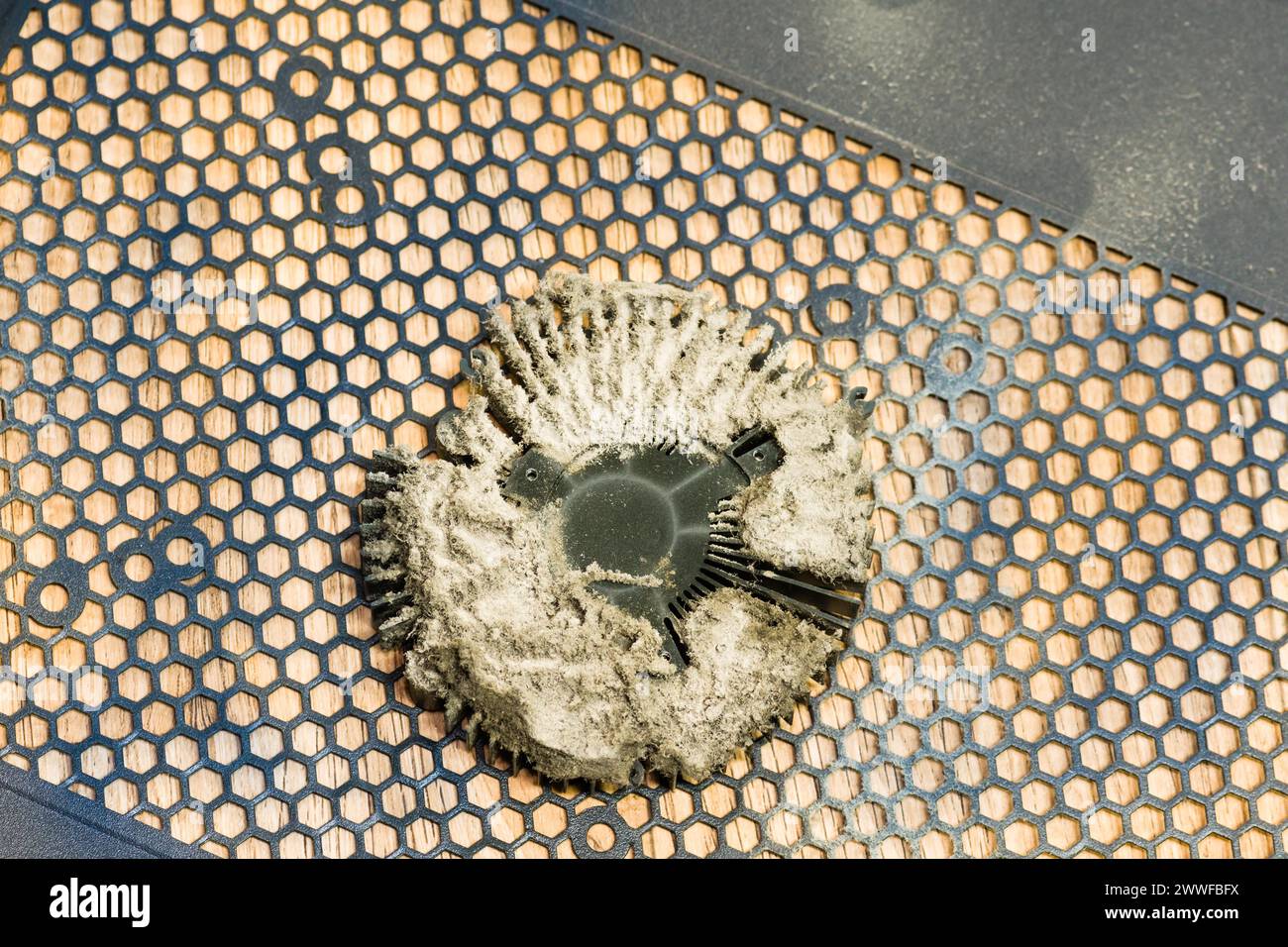 Old thermal paste on a central processing unit (CPU) after removal from ...