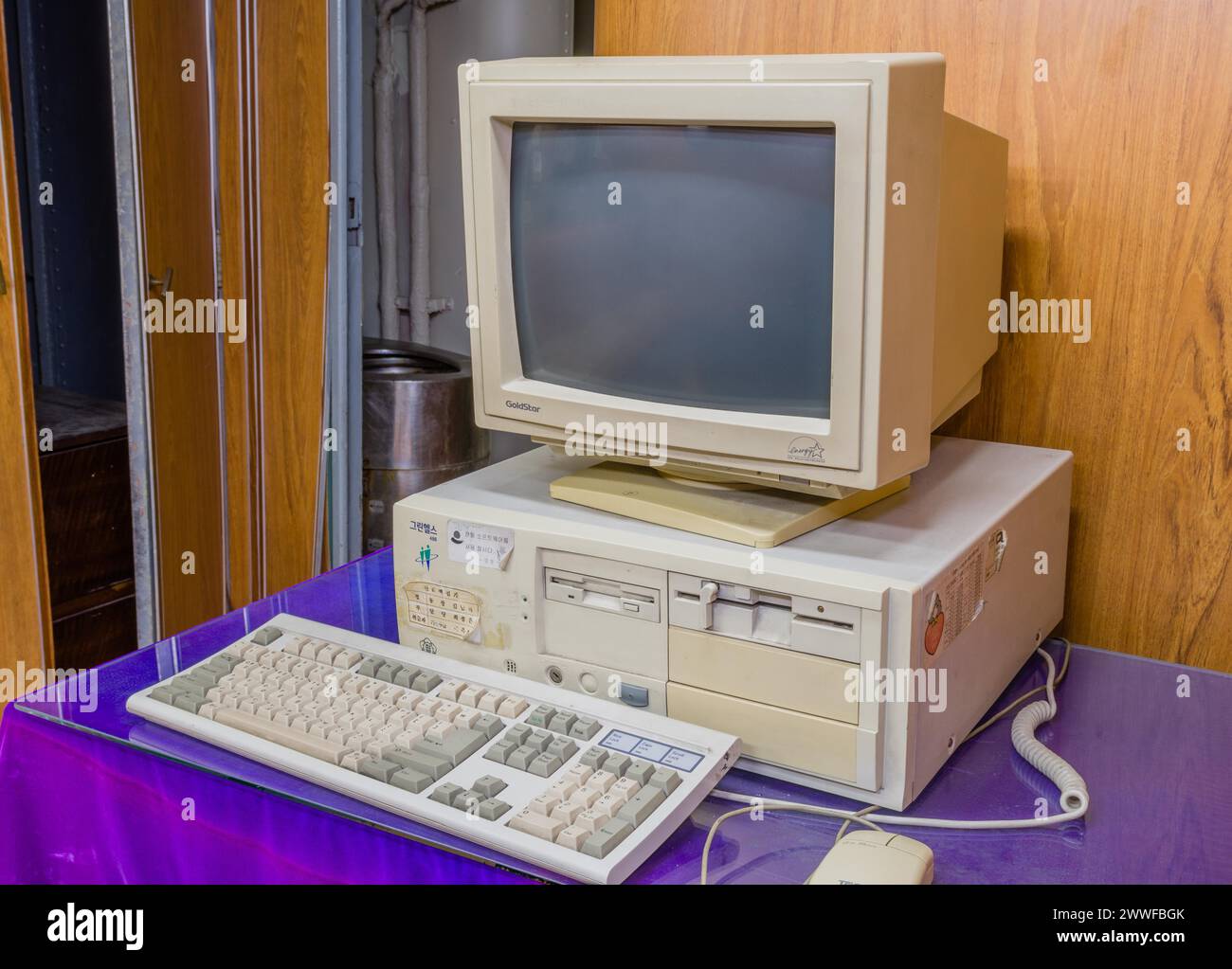 Old computer with both 3.5 and 5 inch disk drive complete with crt monitor and keyboard in ...