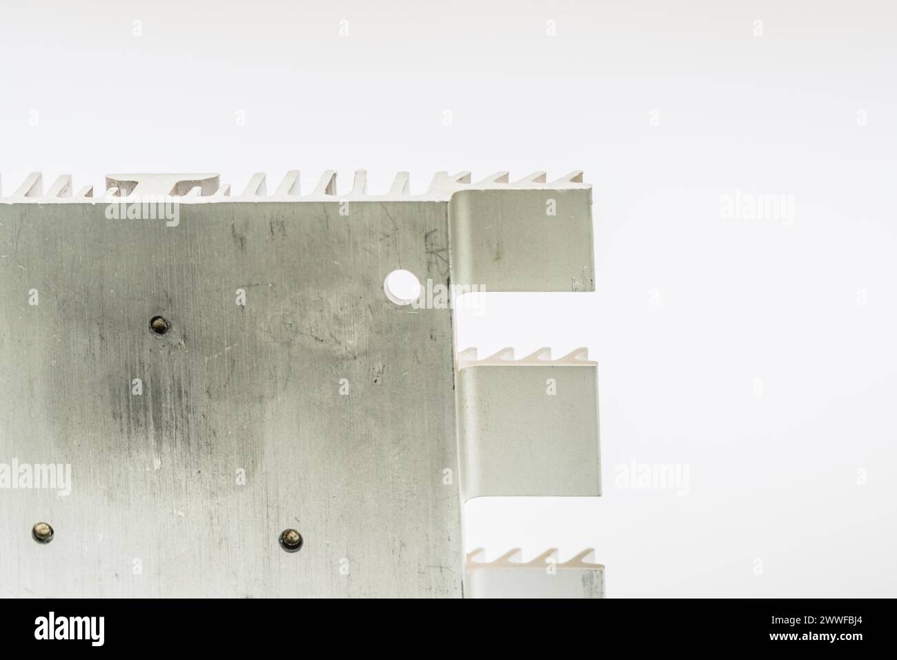Closeup of mounting surface of rectangle aluminum heat sink on white ...