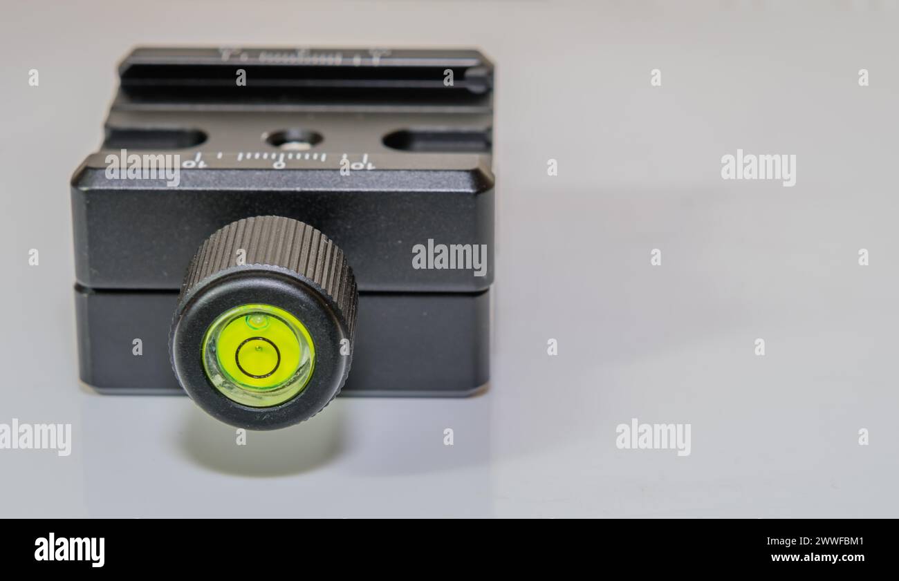 Closeup of bubble level inside locking knob of lock type camera mount ...