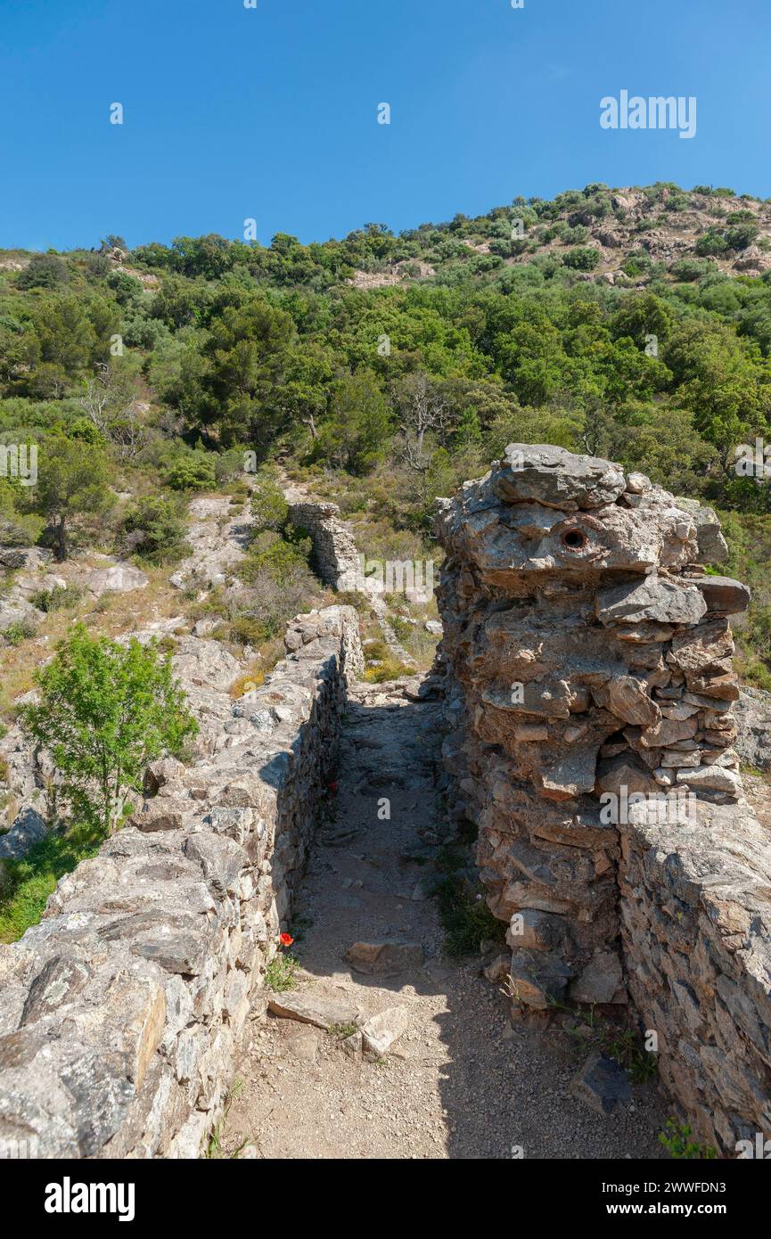 Historic arch bridge Le Pont des Fees with partially preserved water ...