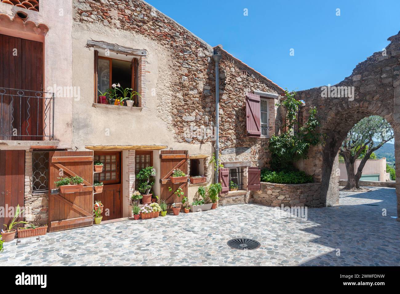 House facade and remains of the former town wall in the historic old ...