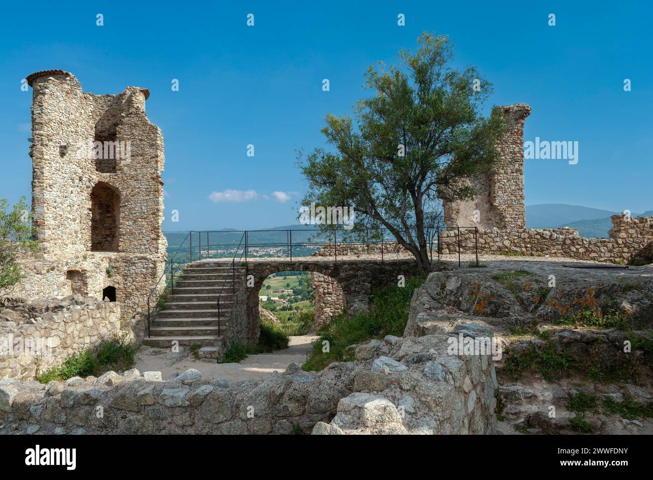 Ruins of Grimaud Castle with a view of the village of Grimaud, in the ...