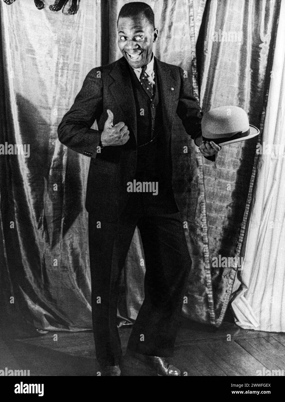 January 25, 1933 Portrait of dancer Bill Robinson showing thumbs up ...