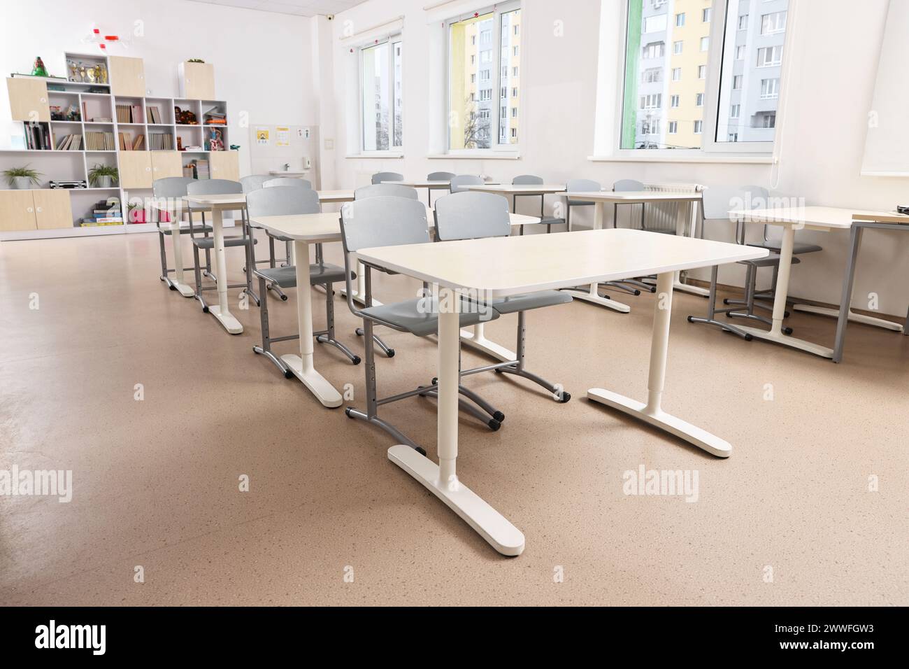 Empty school classroom with contemporary furniture and windows Stock ...