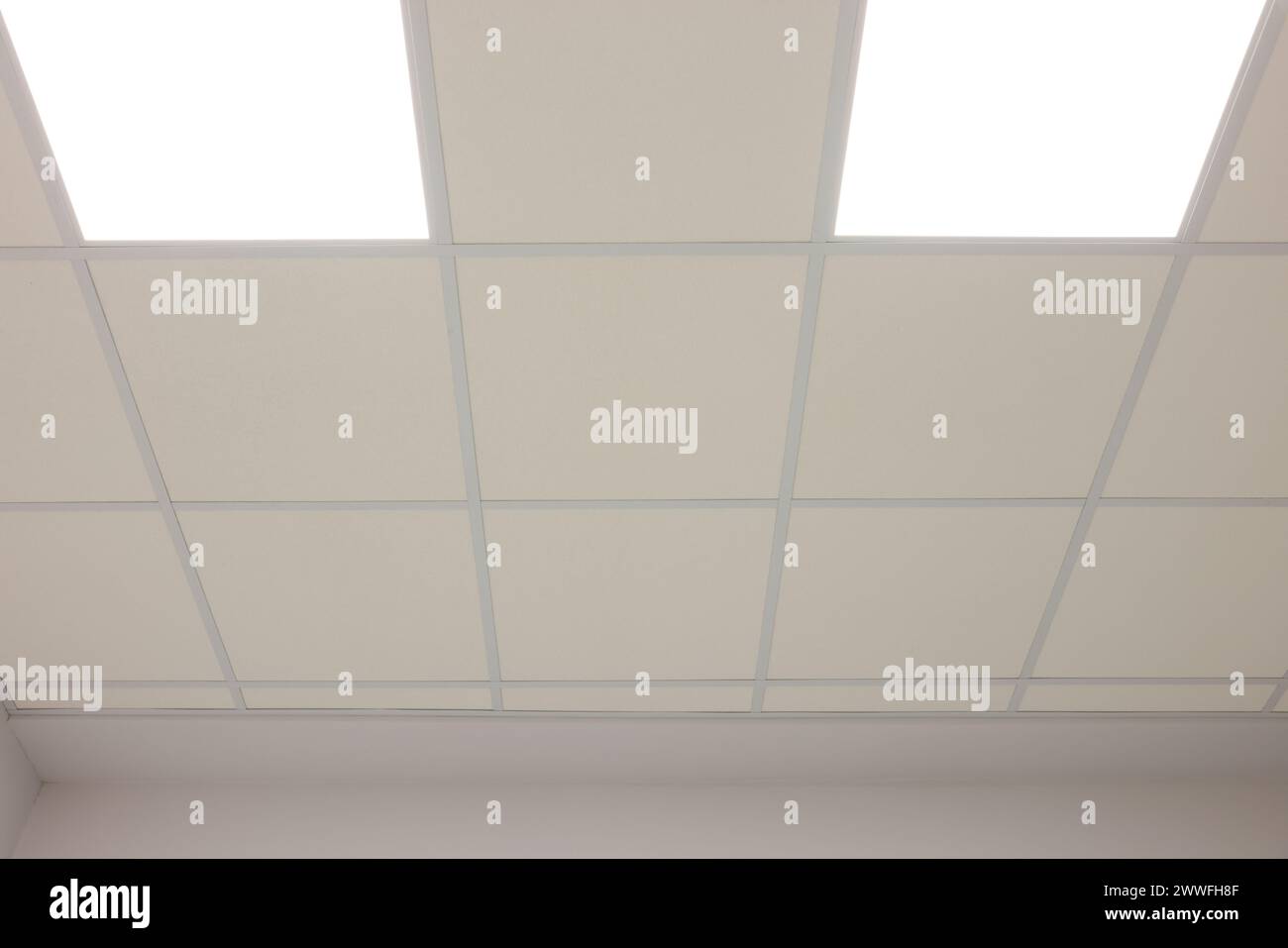 White ceiling with PVC tiles and lighting indoors, low angle view Stock ...