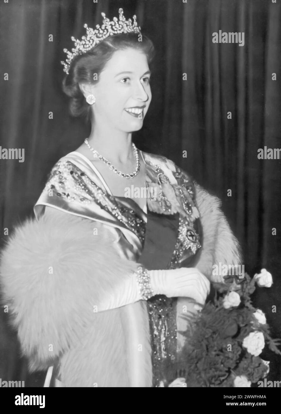 A photograph captures Princess Elizabeth II arriving at the Guildhall ...