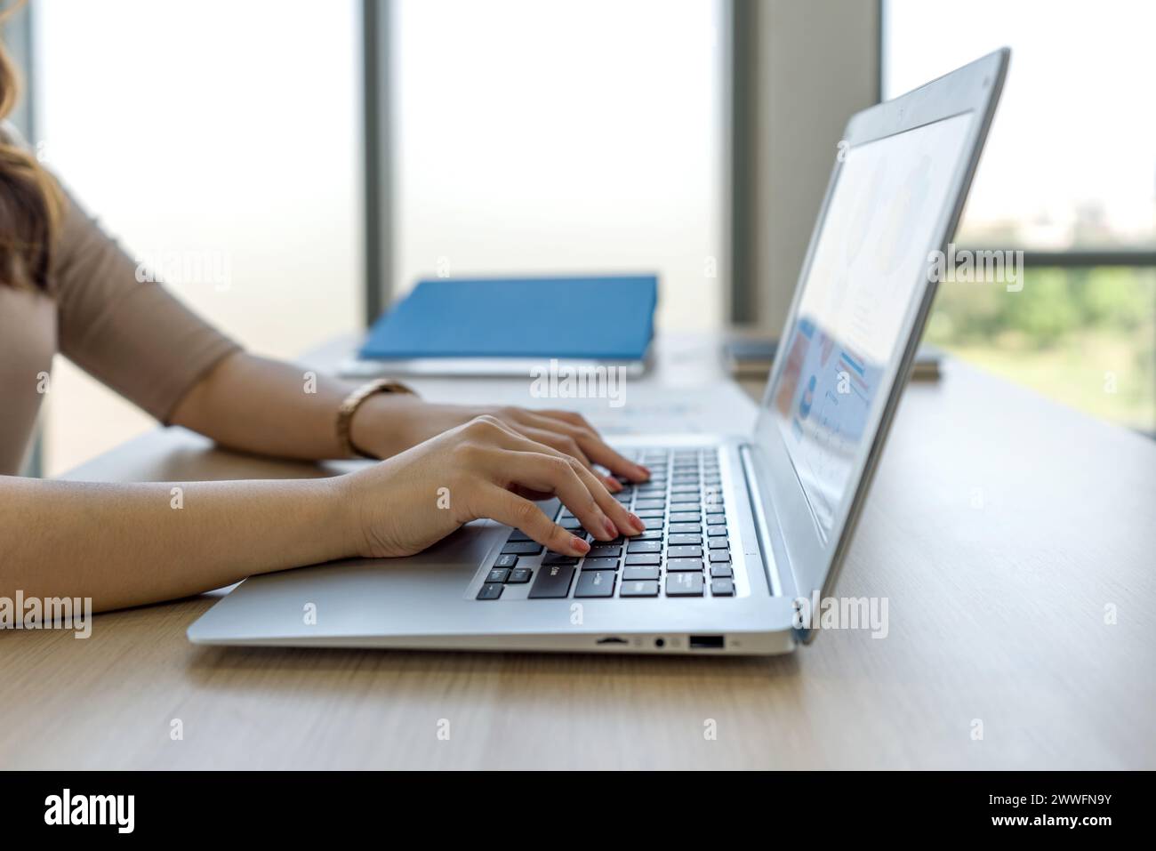 Closeup businesswoman hand typing on laptop computer keyboard. Working ...