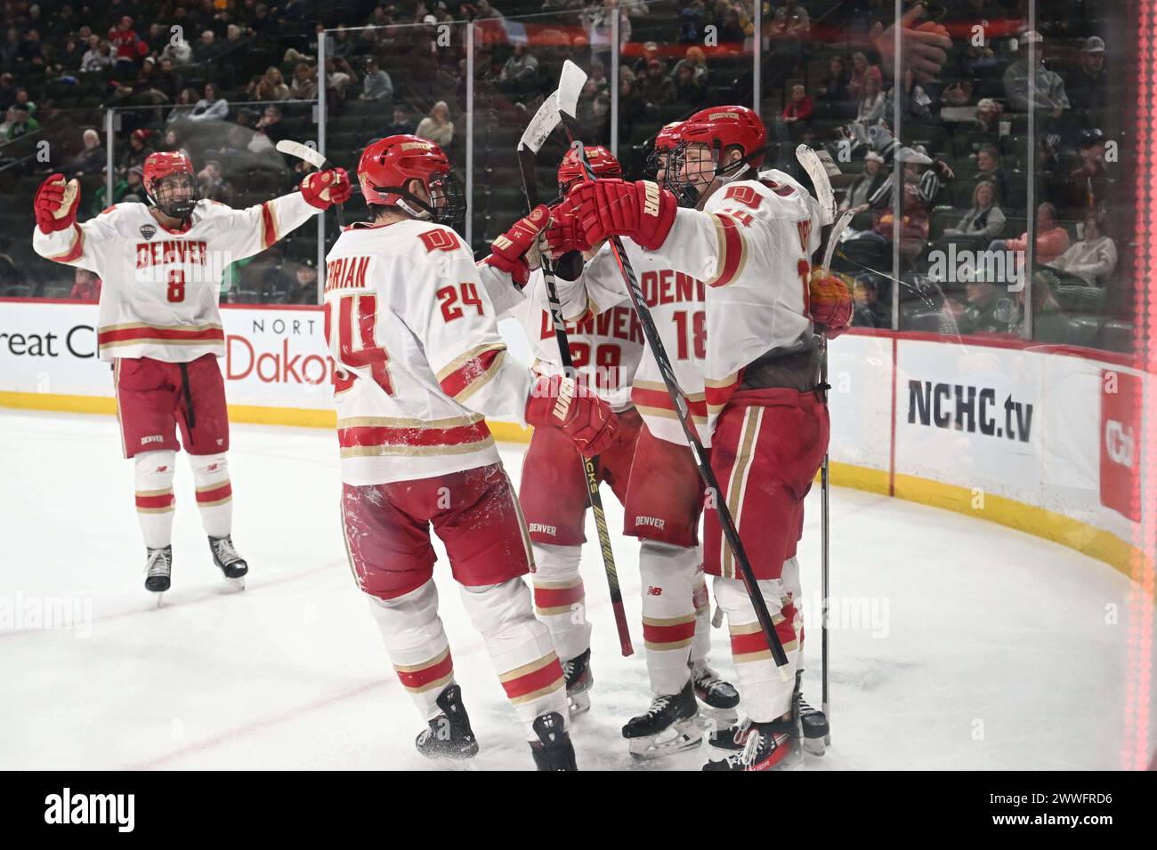 Denver Pioneers forward Rieger Lorenz (14) and teammates celebrate a ...