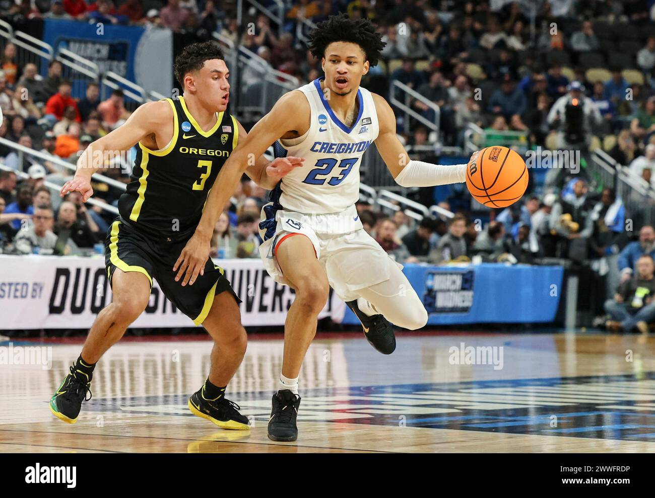 March 23, 2024: Creighton Bluejays guard Trey Alexander (23) drives to ...