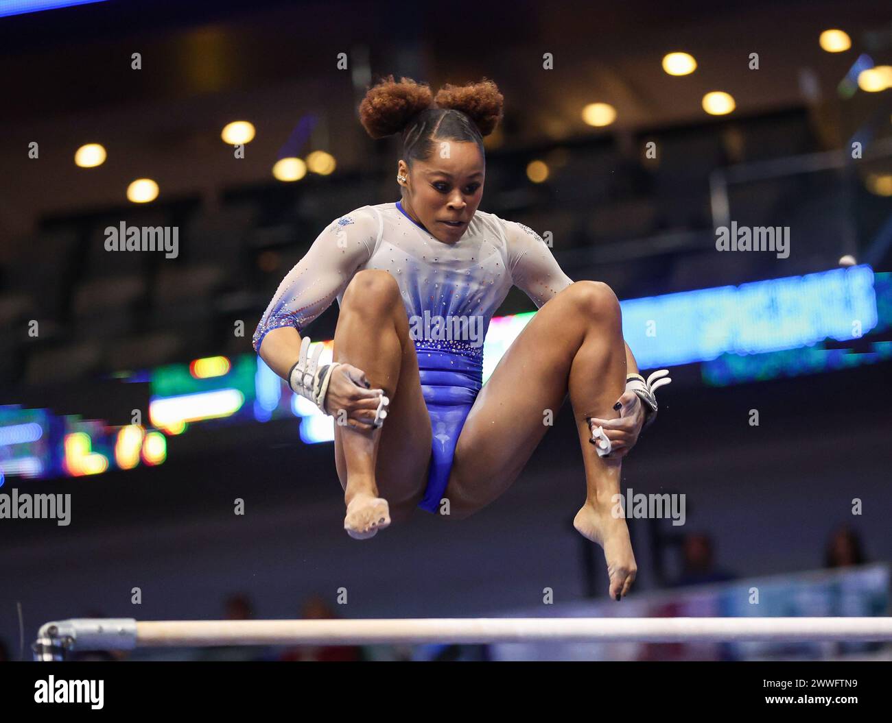 March 23, 2024: Florida's Sloane Blakely dismounts the uneven bars ...