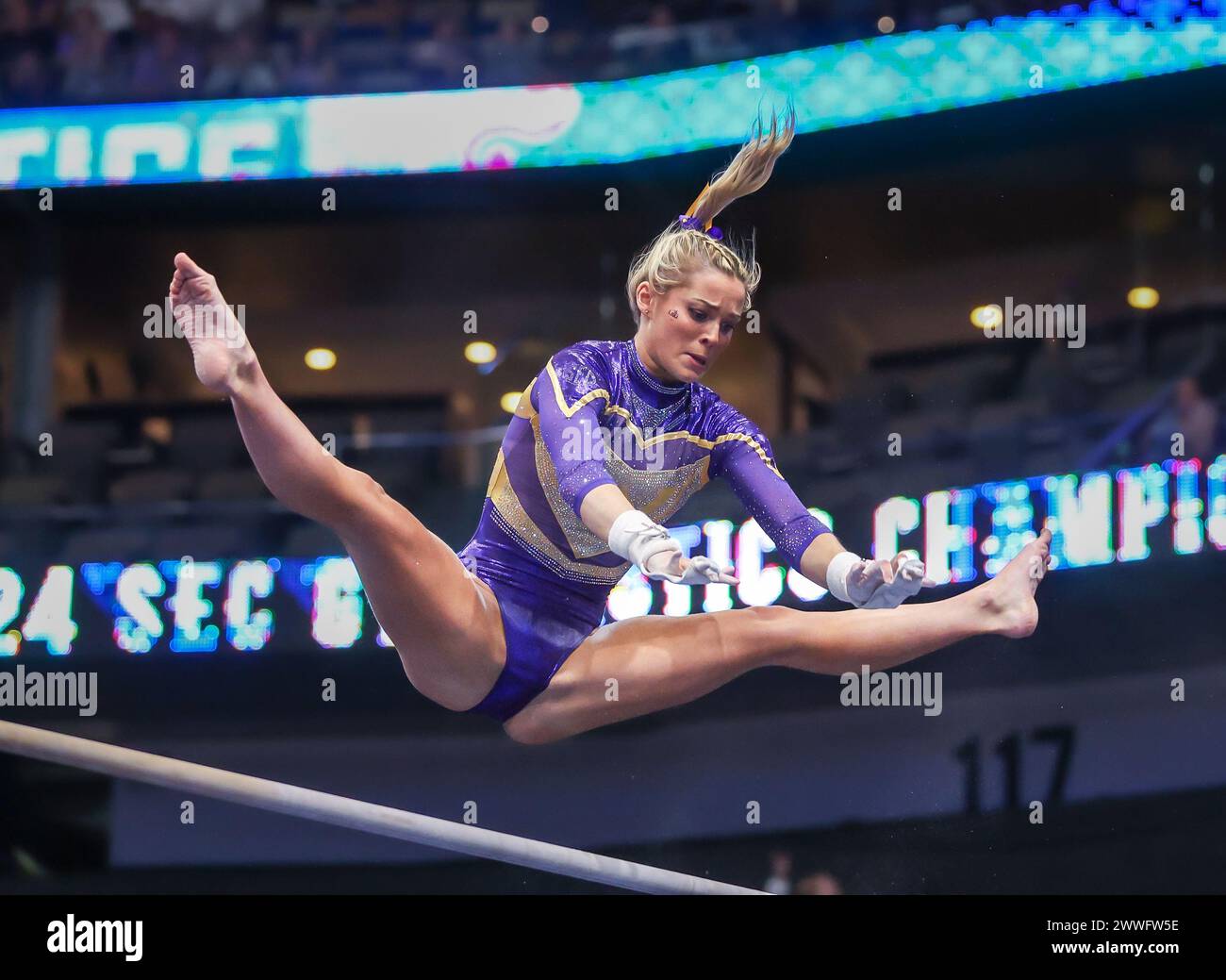 March 23, 2024: LSU's Olivia Dunne competes on the uneven parallel bars ...