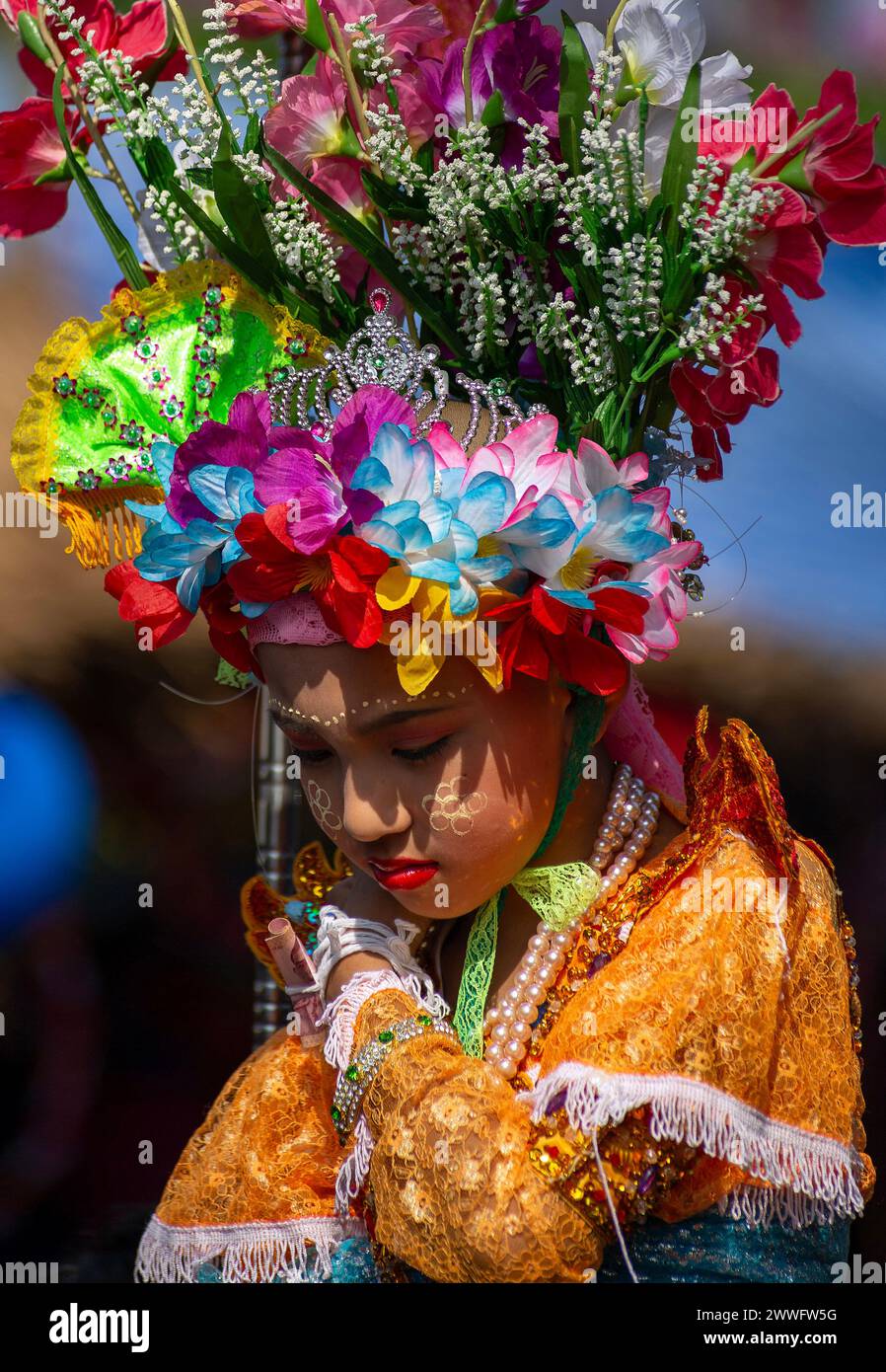 A young ethnic Shan boy dressed in colorful costume seen during an ...