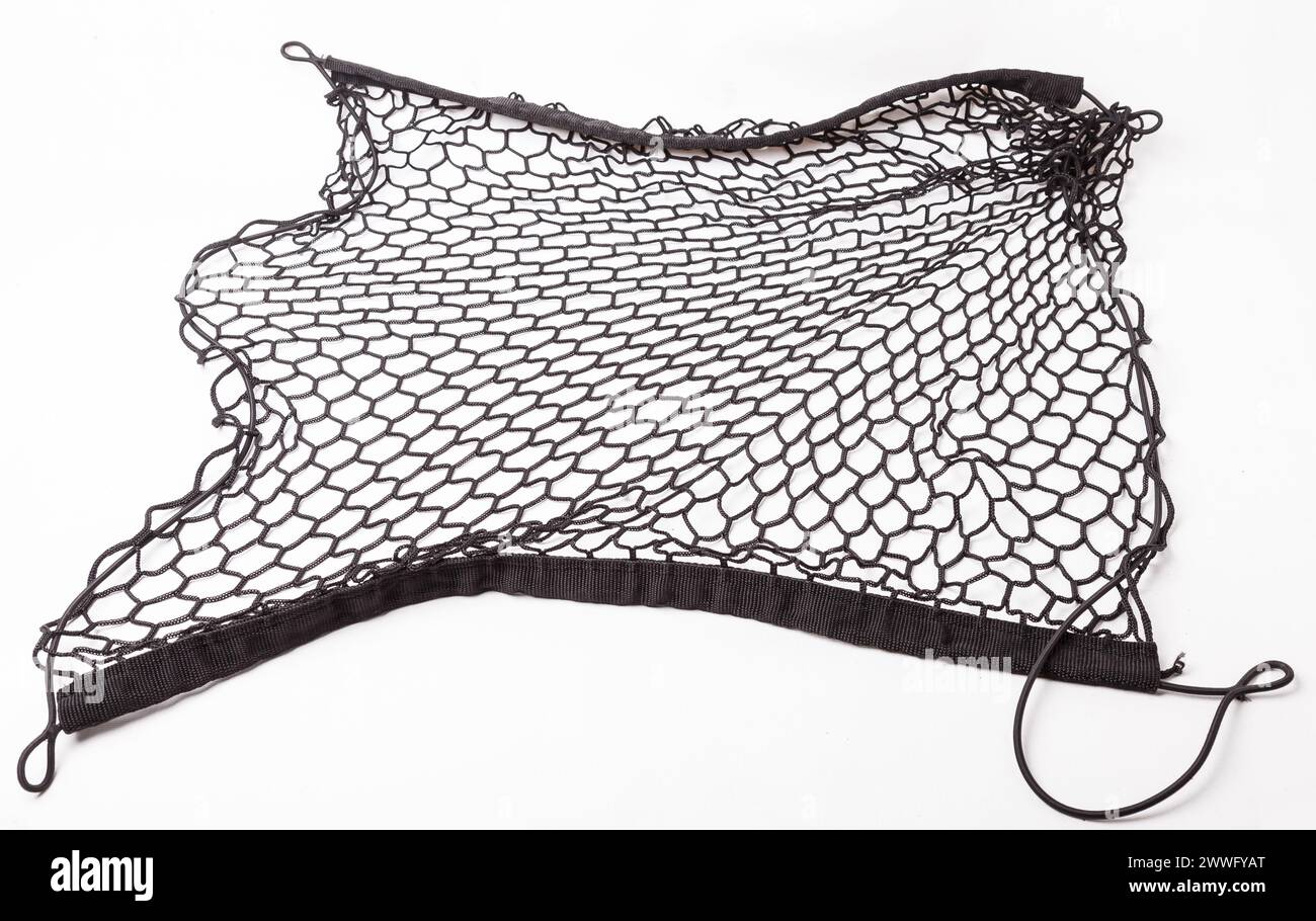 mesh for securing luggage in the luggage compartment of a car on a ...
