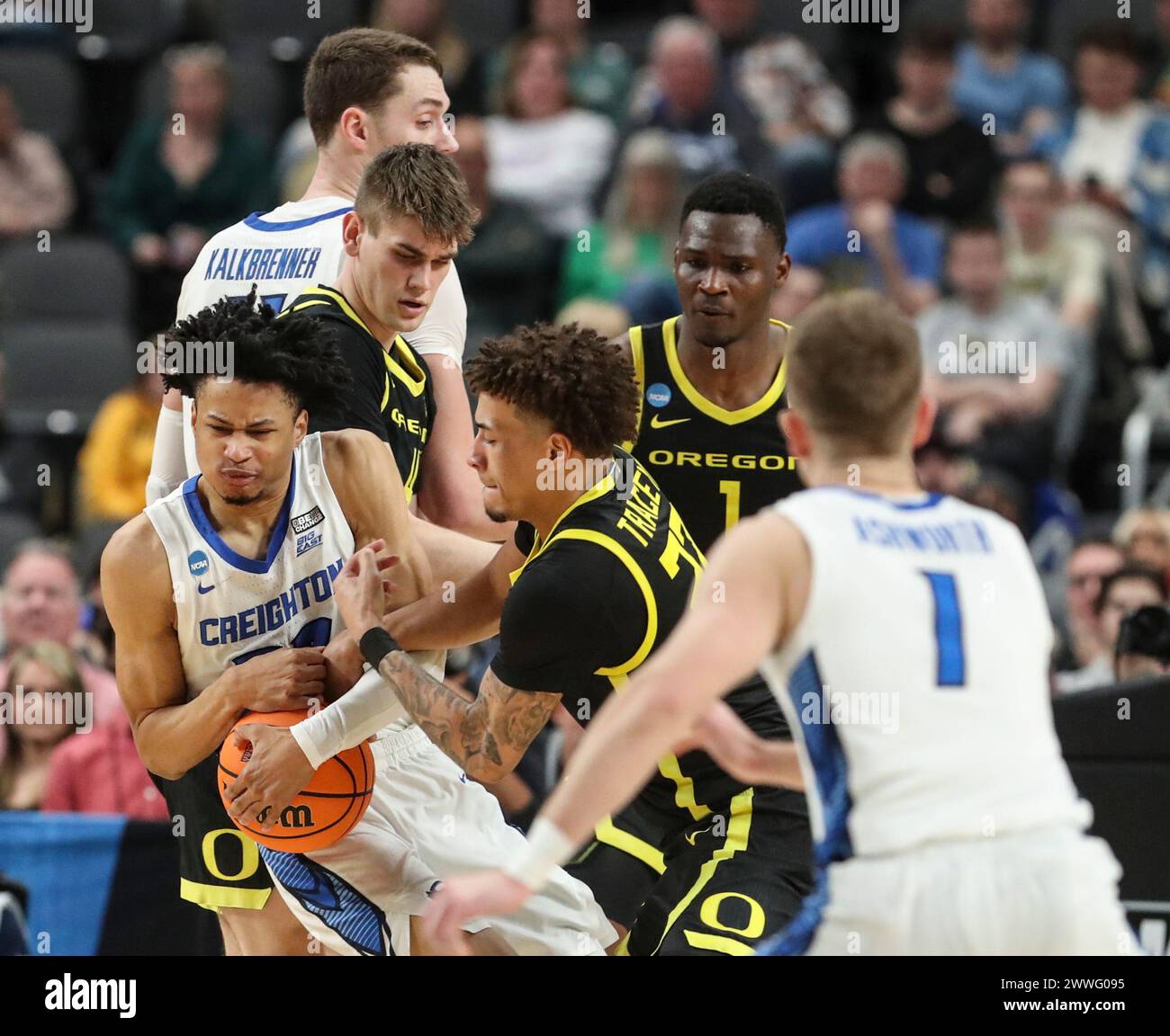 March 23, 2024: Creighton Bluejays guard Trey Alexander (23) battles ...