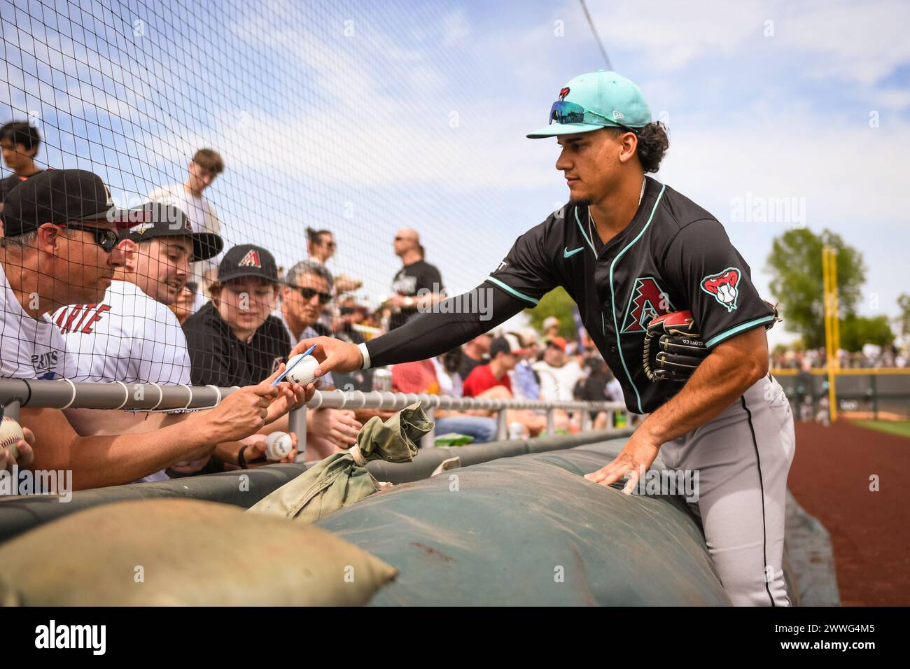 Arizona Diamondbacks center fielder Alek Thomas (5) signs autographs ...