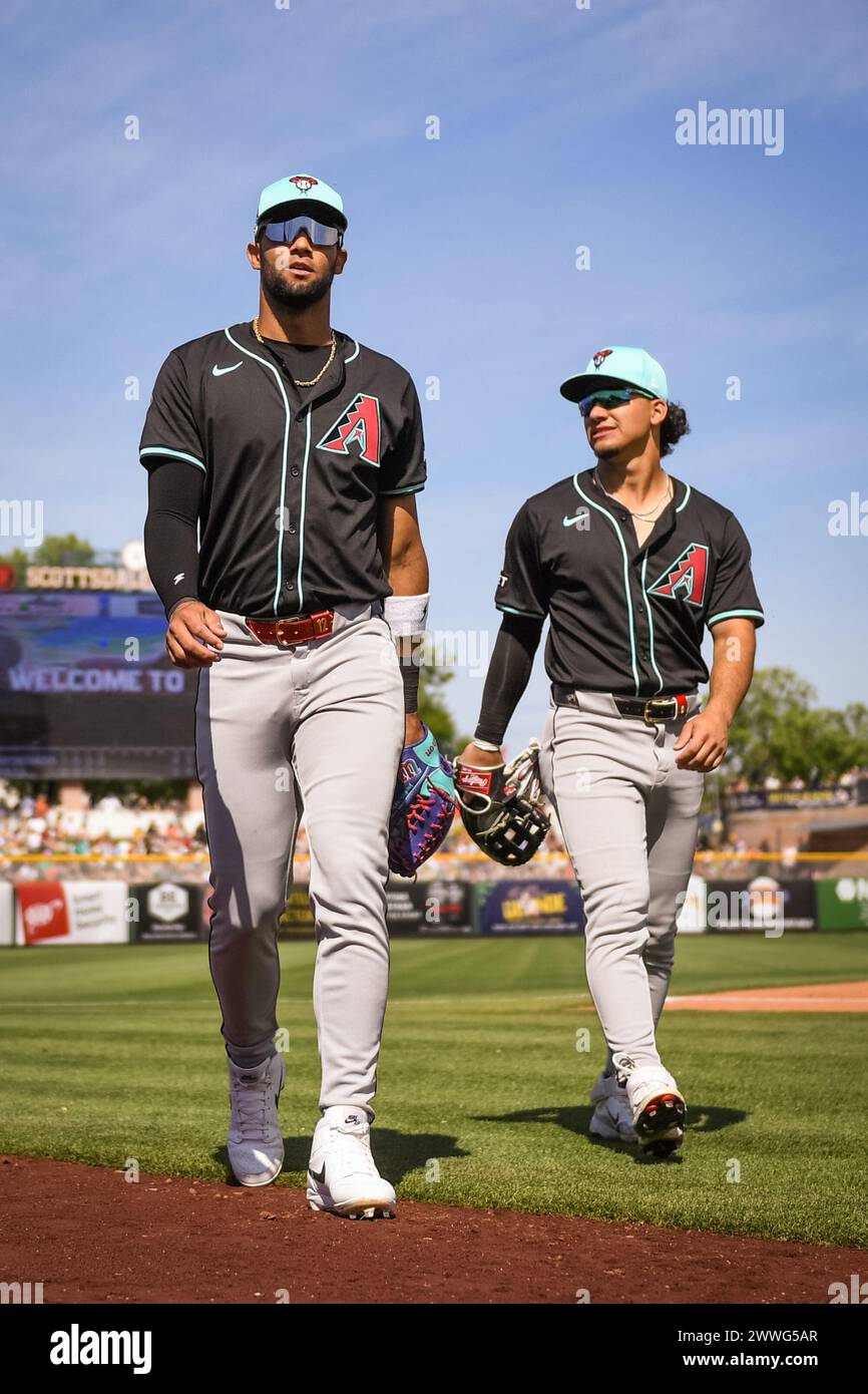 Arizona Diamondbacks left fielder Lourdes Gurriel Jr. (12) and center ...
