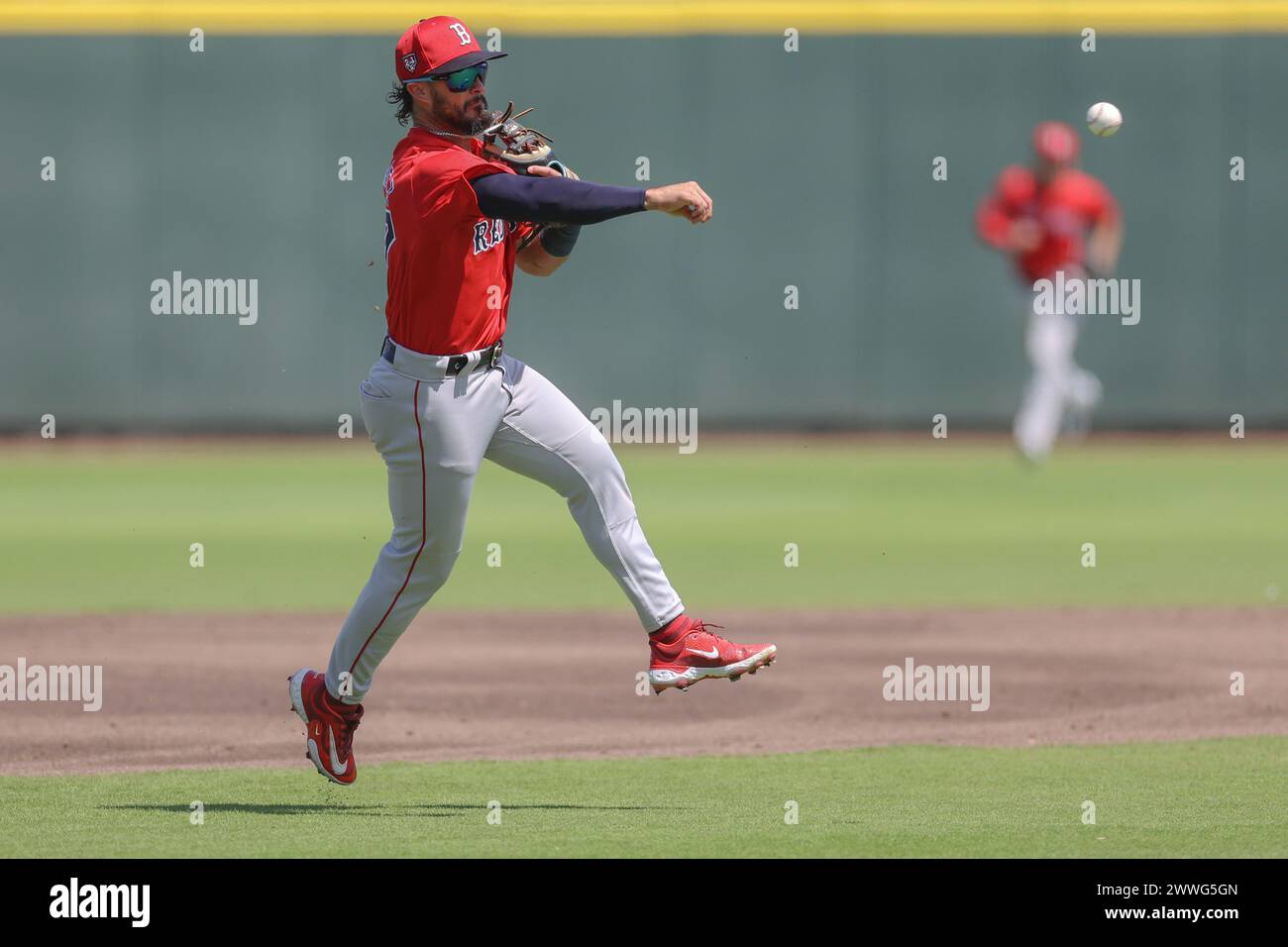 Bradenton, FL: Boston Red Sox third baseman Eddy Alvarez throws out ...