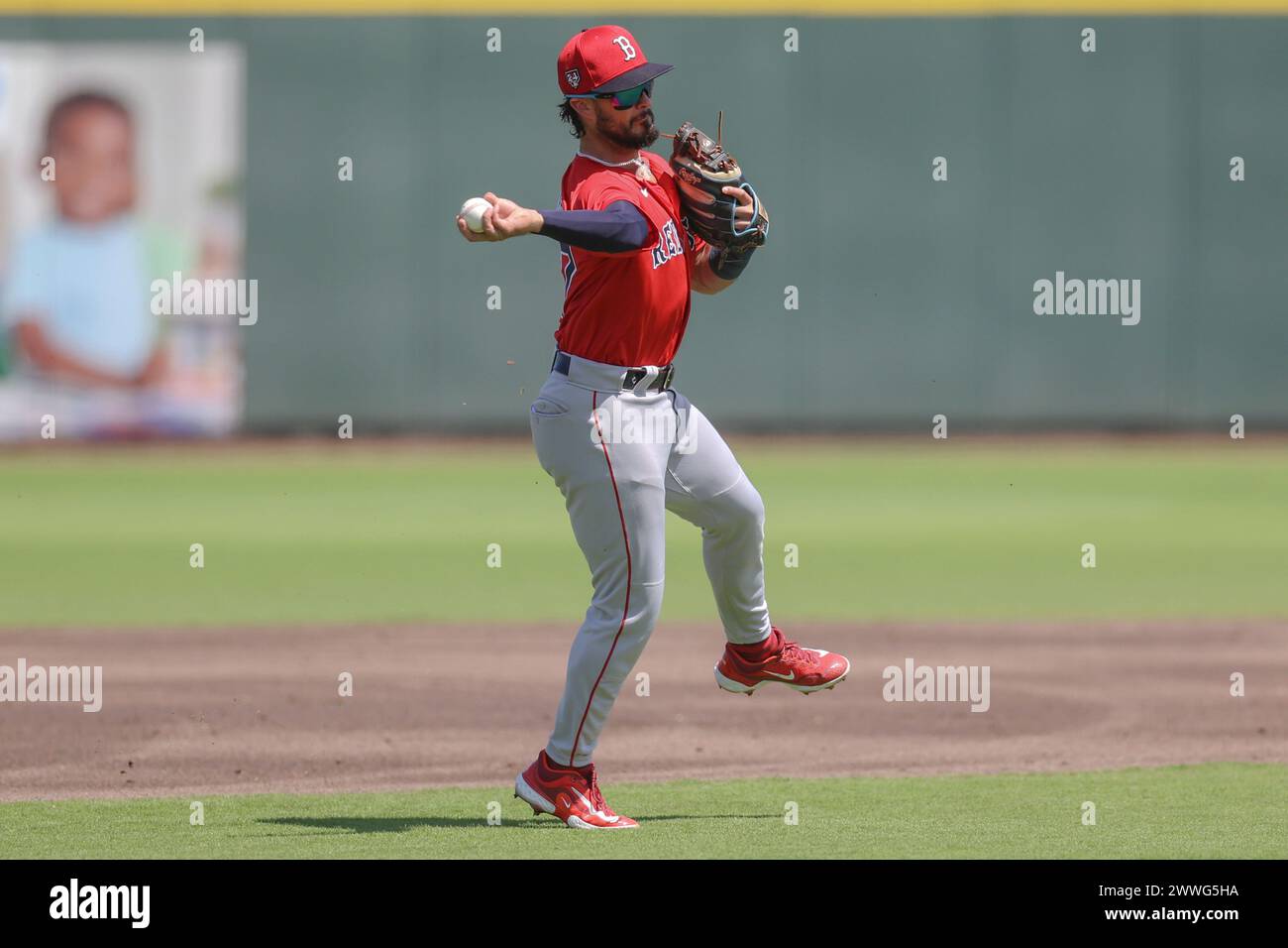 Bradenton, FL: Boston Red Sox third baseman Eddy Alvarez throws out ...