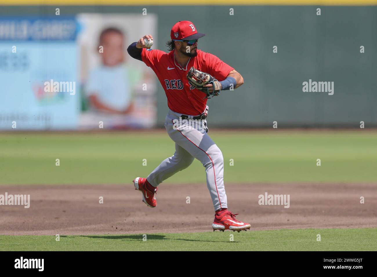 Bradenton, FL: Boston Red Sox third baseman Eddy Alvarez throws out ...