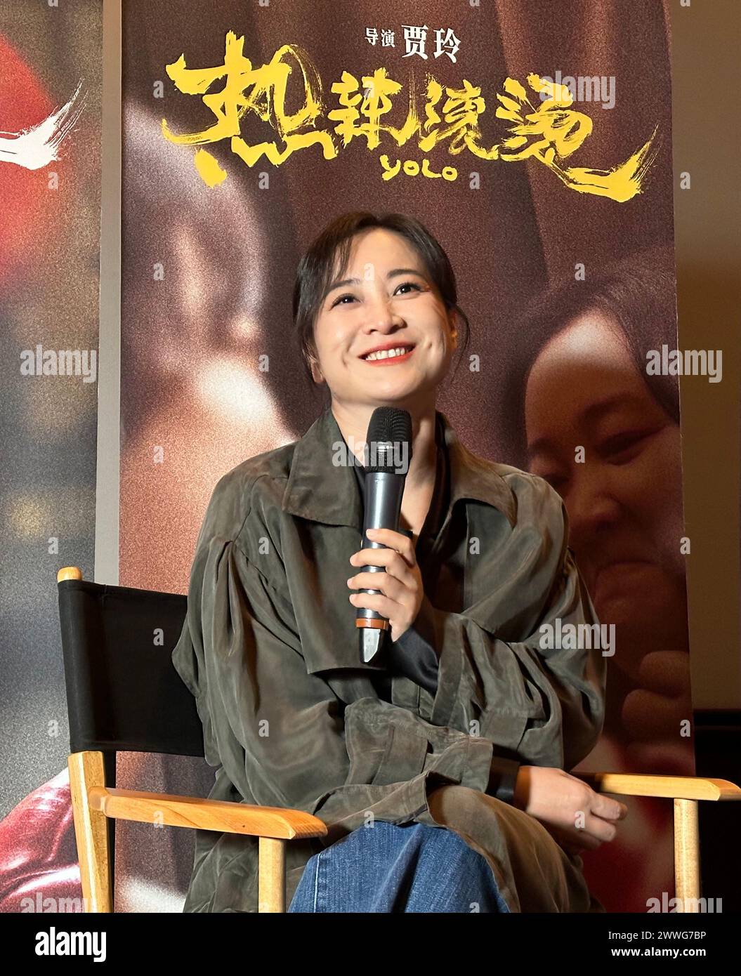 Los Angeles, USA. 20th Mar, 2024. Director Jia Ling talks to the ...