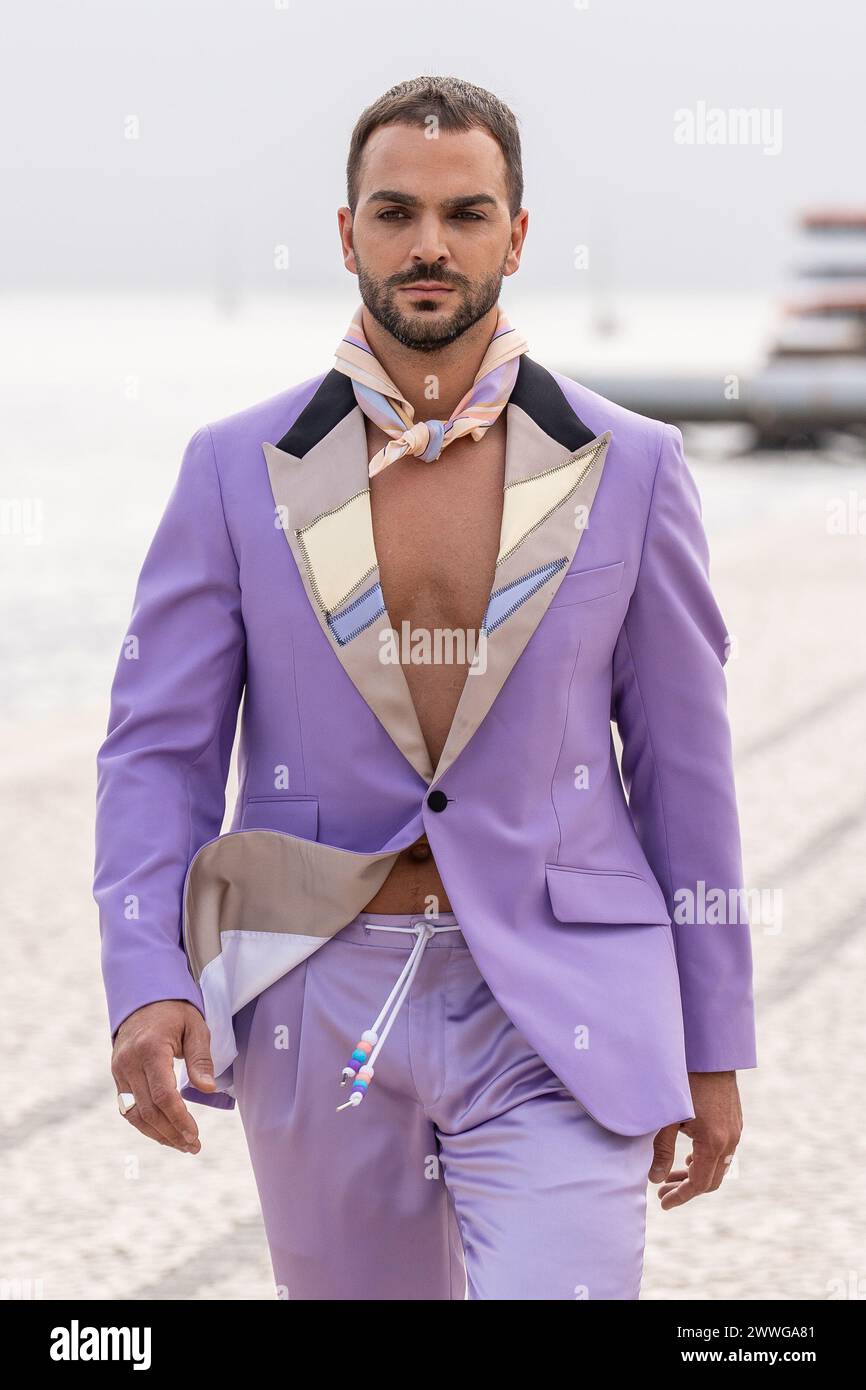 Lisbon, Portugal. 23rd Mar, 2024. A model walks the runway during Nuno ...