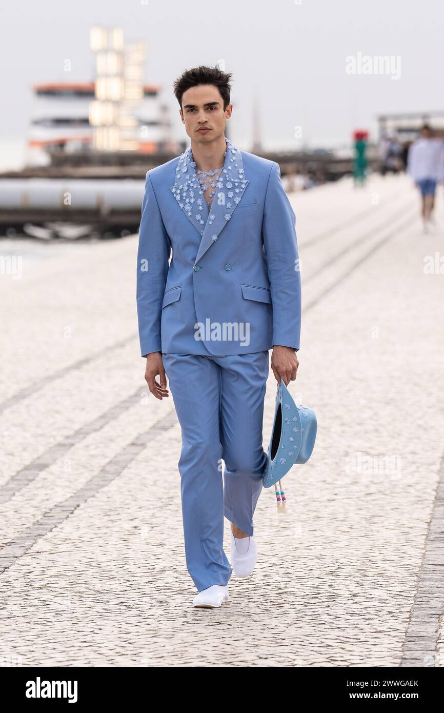 Lisbon, Portugal. 23rd Mar, 2024. A model walks the runway during Nuno ...