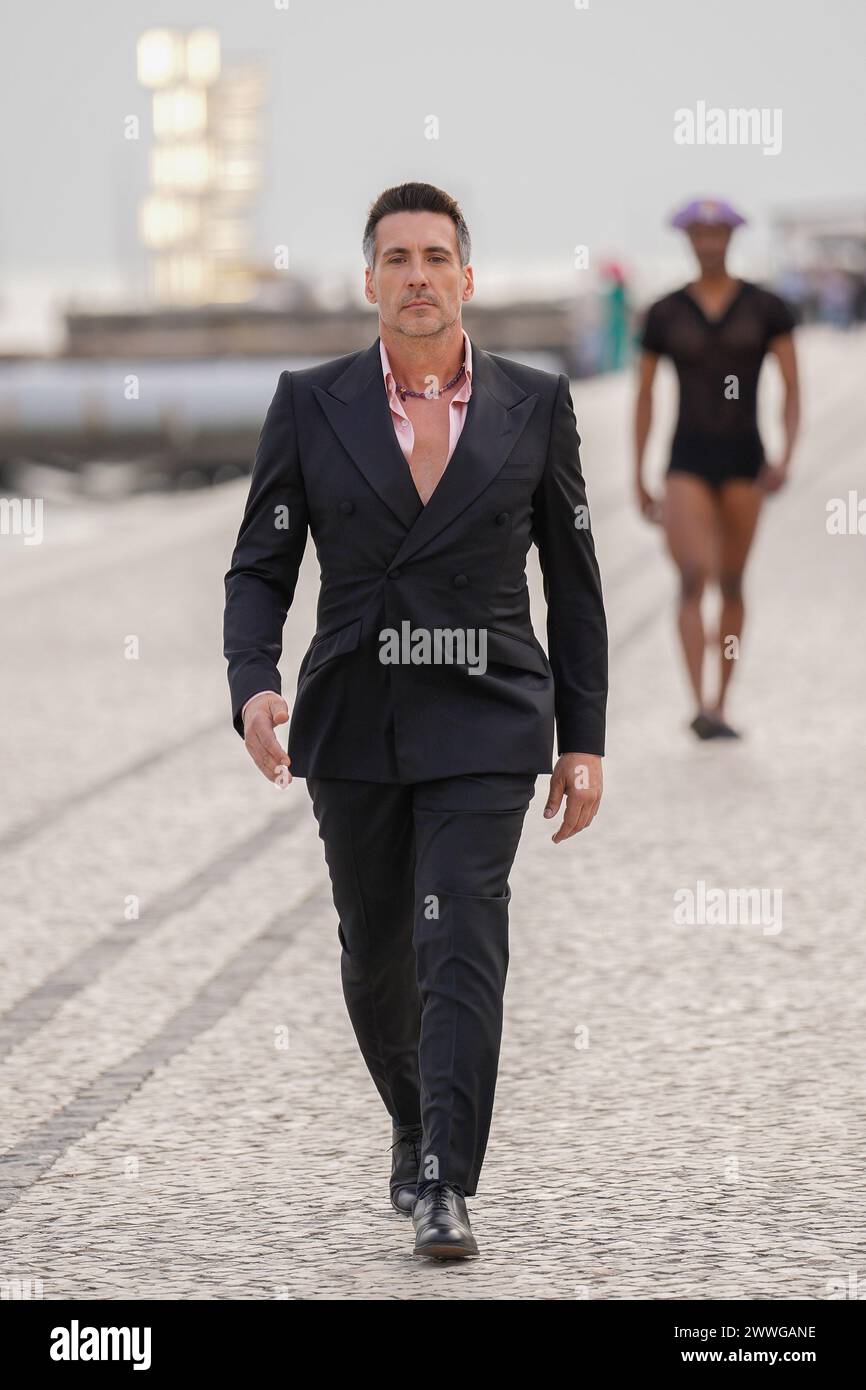 Lisbon, Portugal. 23rd Mar, 2024. A model walks the runway during Nuno ...