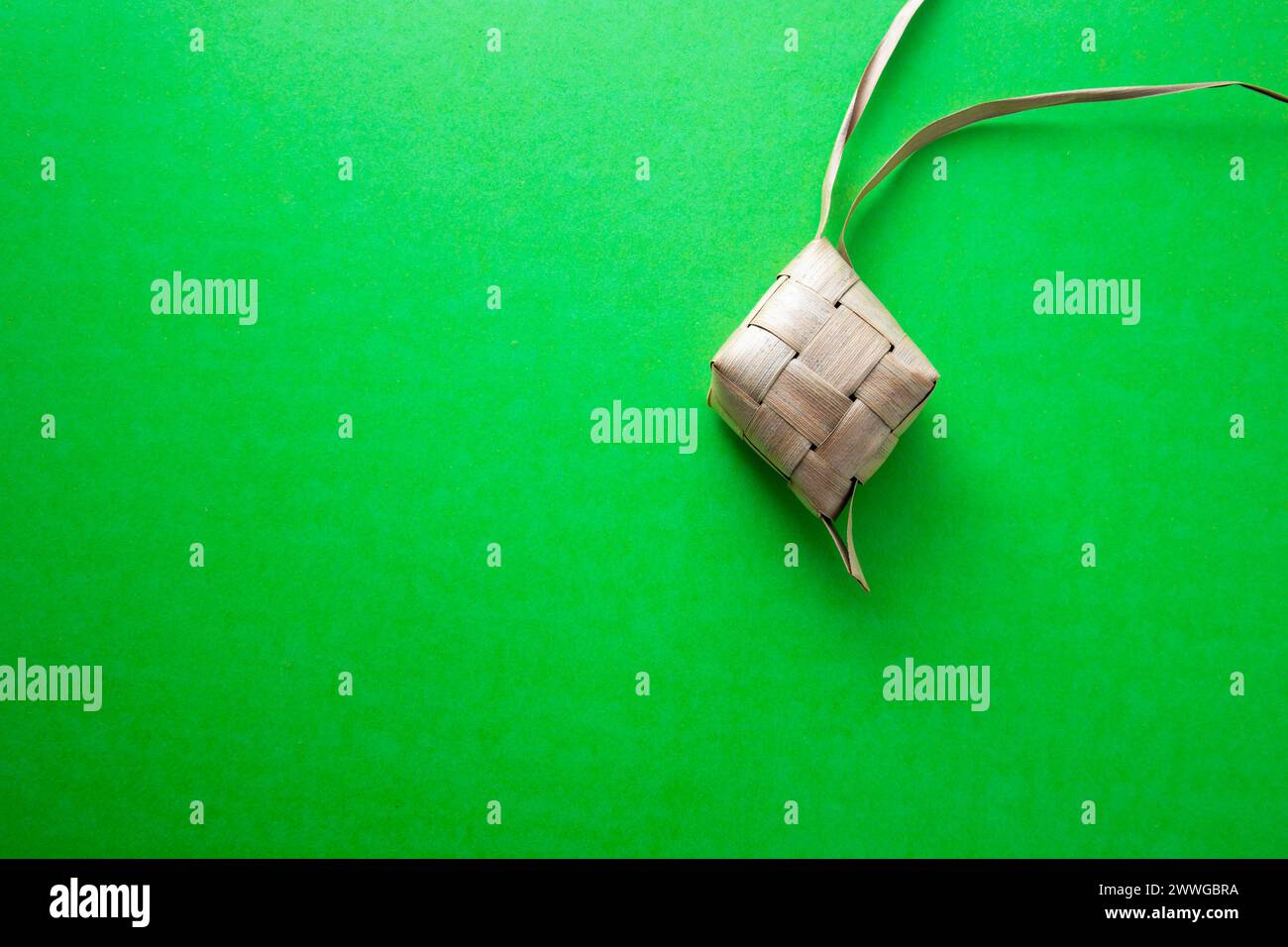 Ketupat. Traditional fasting after Ramadan. Rice dish wrapped in woven ...