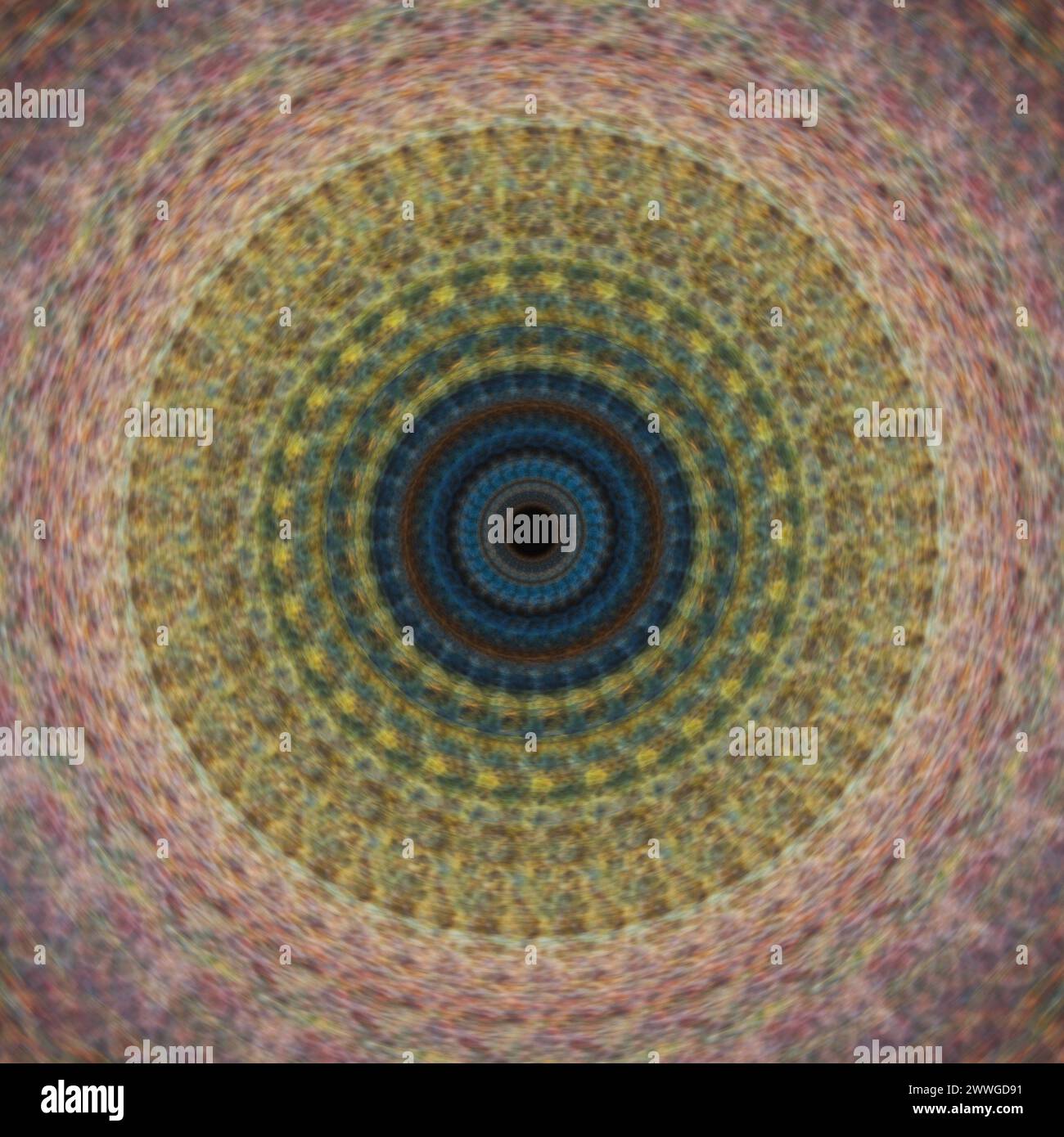 Mandala with blue center and gold. The dabbing technique near the edges ...